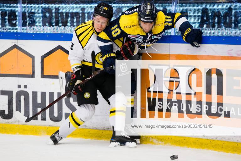 Brynäs Elias Fabien in duel with HV71 s Martin Thörnberg during ice hockey match in the SHL between