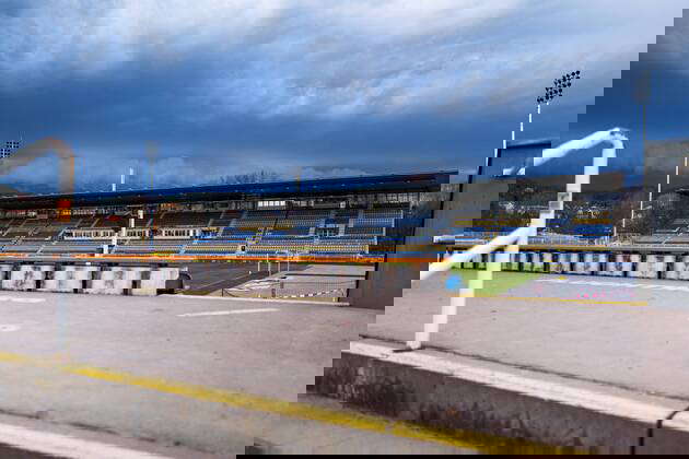 Dark black clouds over the Ernst Abbe sports field EAS Jena the home ...