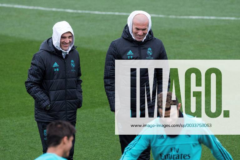 Real Madrid s head coach, Zinedine Zidane (C), and assistant coach ...