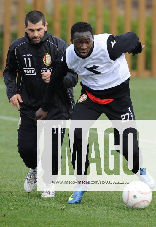 - VALENCIA, SPAIN: Standard s Salim Toama and Rudy Mansoni Ngombo ...