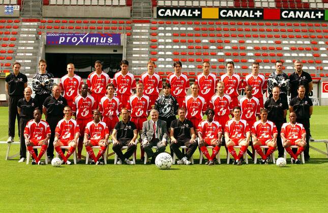 BRU01 - - MOUSCRON, BELGIUM : The players and staff members pose for ...