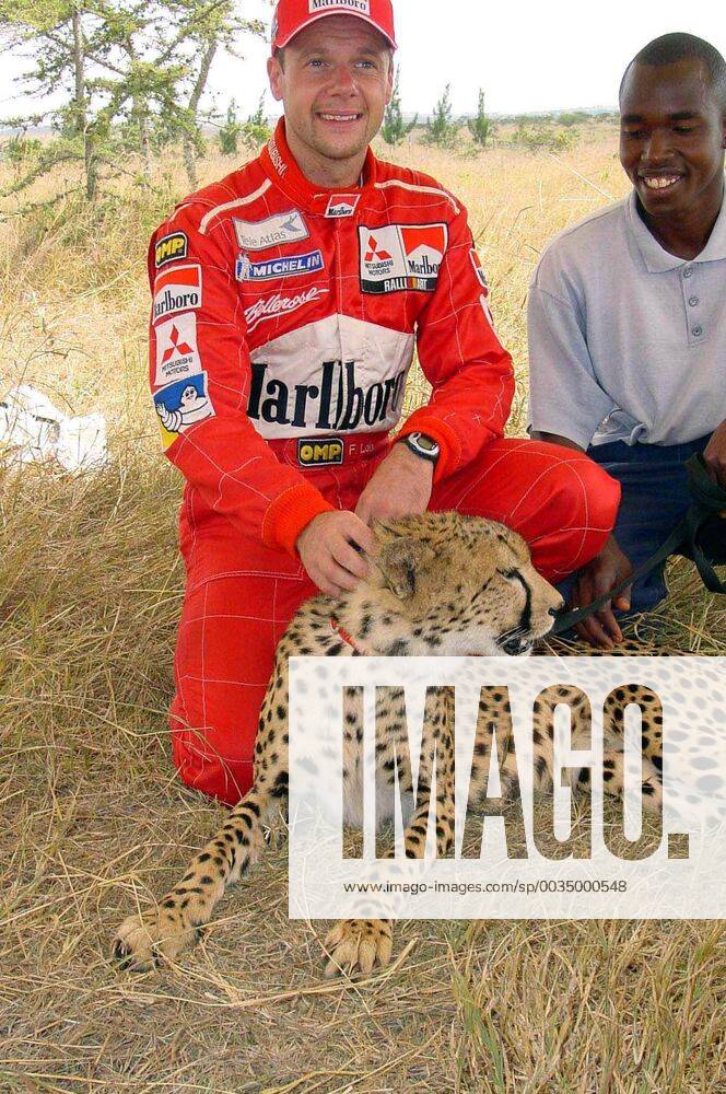 BRU33 - - KISERIAN, KENYA: Belgian rally driver Freddy Loix poses ...