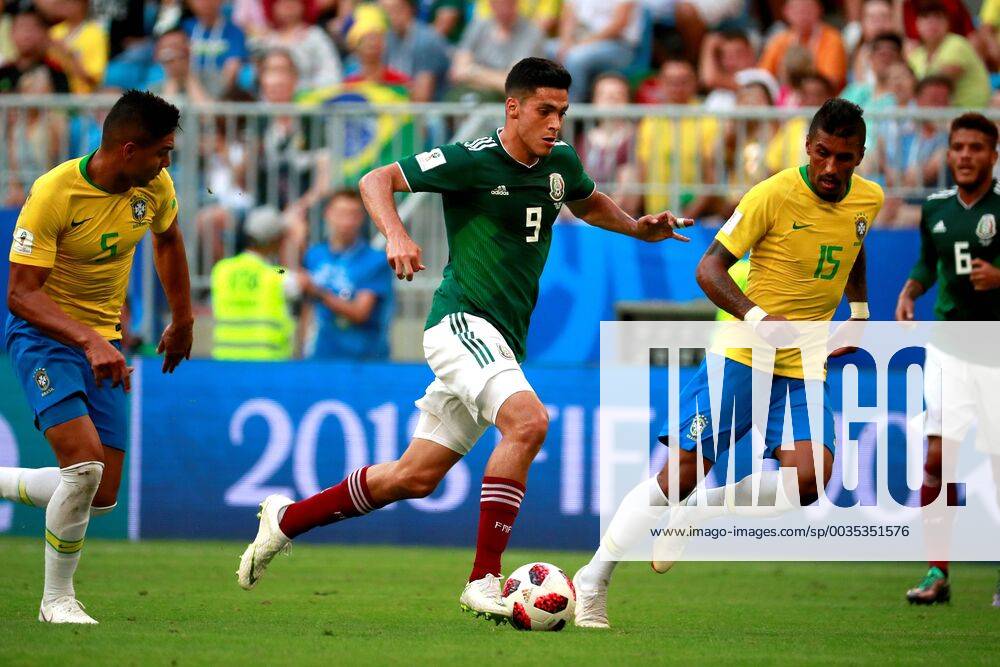 Mexican forward Raul Jimenez (C) and Brazilian midfielder Paulinho (2R ...