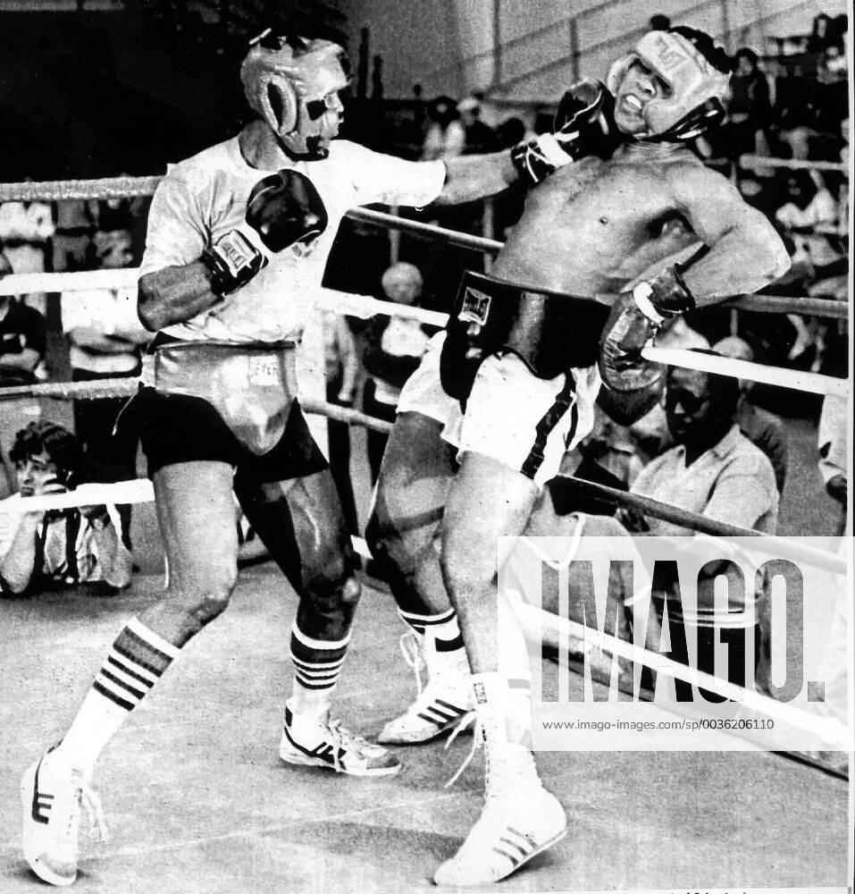 THIRTY-EIGHT-YEAR-OLD MUHAMMAD ALI TAKES ONE THE CHIN FROM HIS TWENTY ...