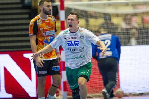 Skanderborgs Lars Skaarup cheers after a goal in the mens handball ...