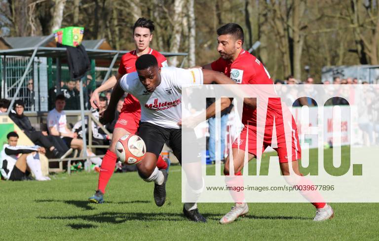 MIchael Kobert LSK in duel scramble with Denis Kina Lüneburger SK Hansa ...