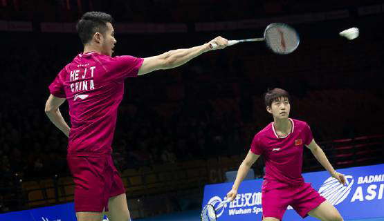 WUHAN, He Jiting Du Yue of China compete during the mixed doubles final ...