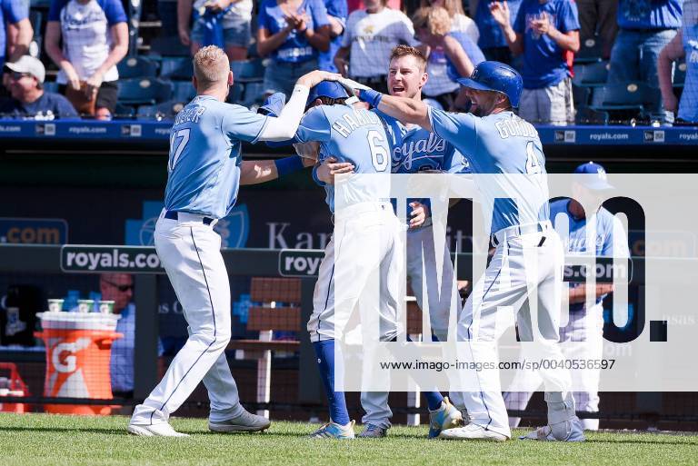 : Teammates mob Kansas City Royals center fielder Billy Hamilton after ...