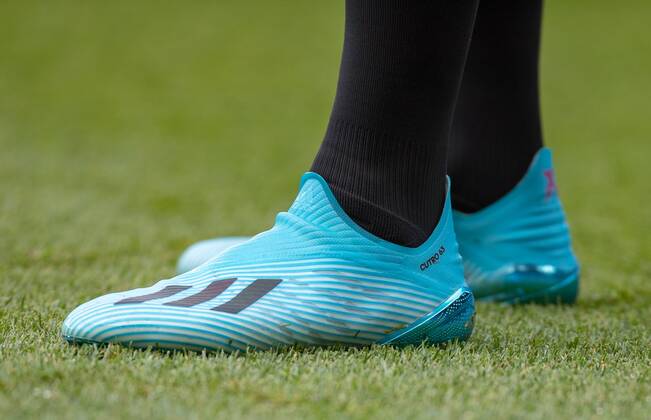 The Adidas x football boots of Patrick Cutrone of Wolves displaying ...