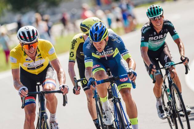 The leader in the overall standings Daryl Impey RSA SAF with his team ...