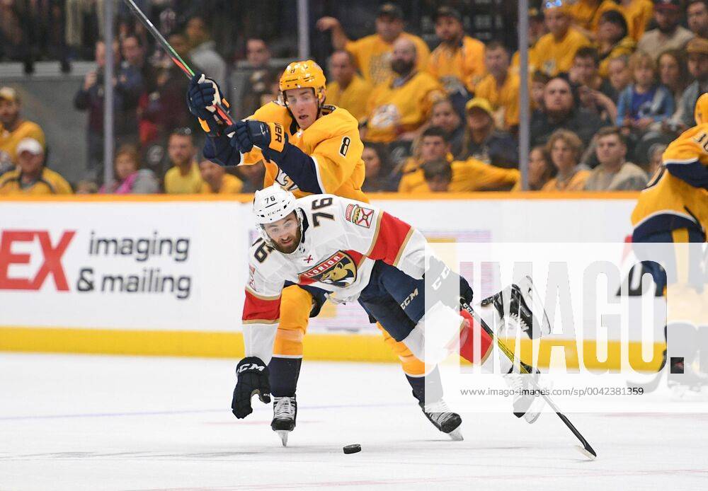 ; Nashville Predators center Kyle Turris checks during the first period ...
