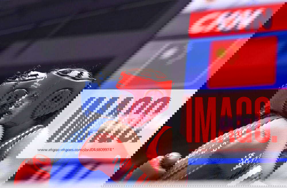 WUHAN, Oct. 25, 2019 -- Dou Dan of China competes with Kim Jin Son of ...