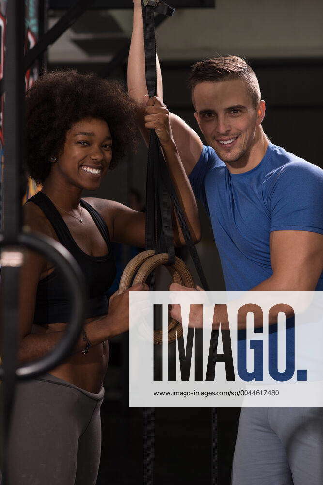 Dip ring young man and african american woman relaxed after workout at ...