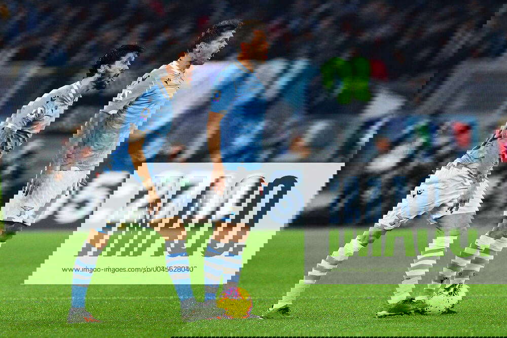 Luis Alberto and Senad Lulic of Lazio react during the Italian ...