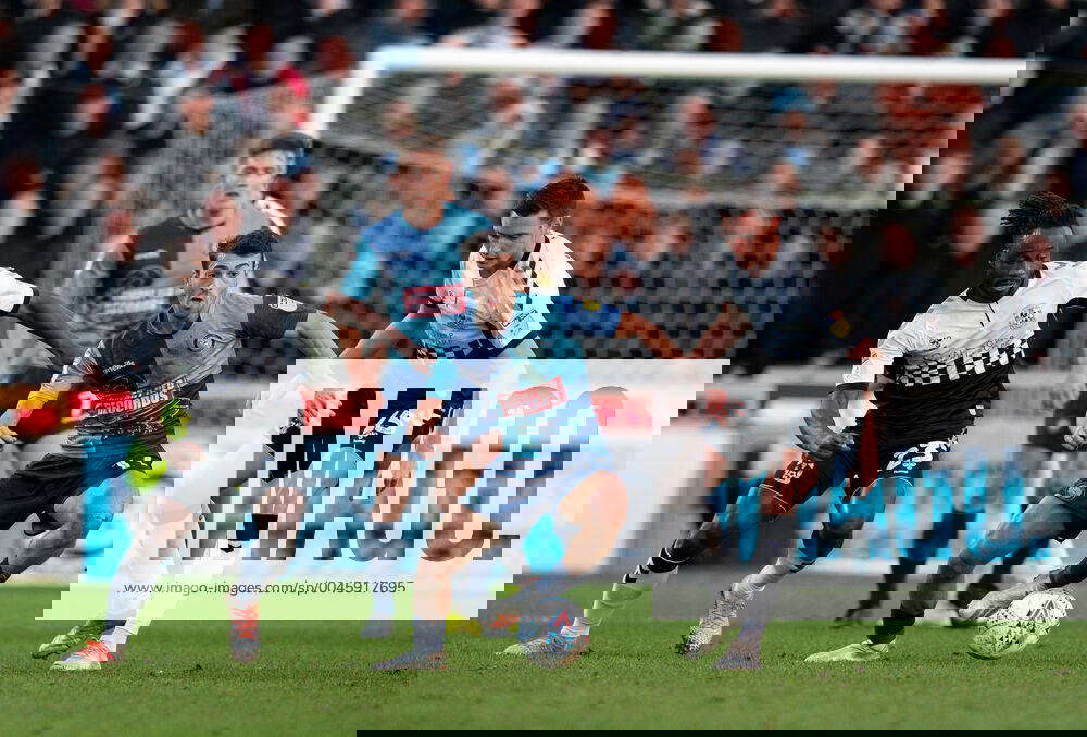 Scott Kashket of Wycombe Wanderers between Fankaty Dabo & Dominic Hyam ...