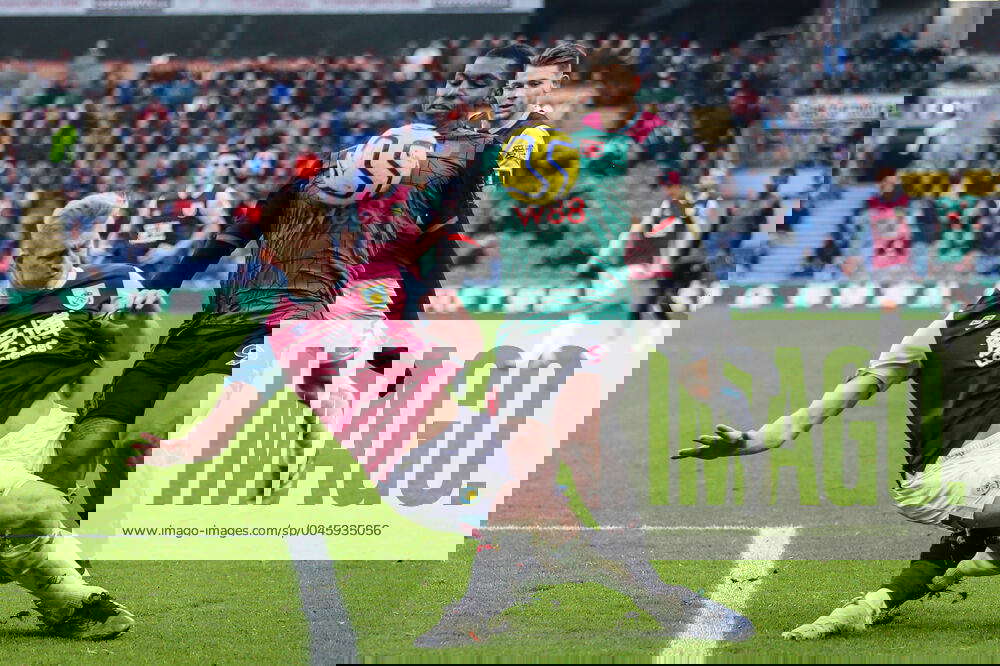 Ben Mee of Burnley tackles Wesley of Aston Villa which leads to an ...