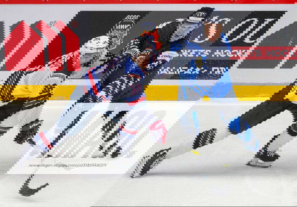 L-R Nick Robertson and Ville Petman in action during the 2020 IIHF World Junior Ice hockey