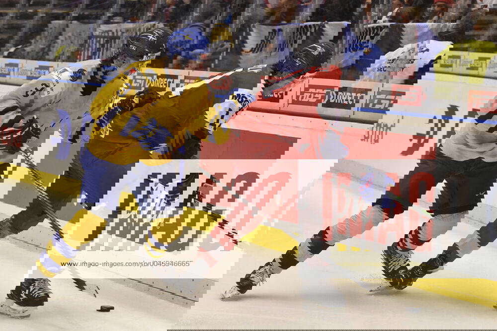 L-R Tobias Bjornfot and Michal Teply in action during the 2020 IIHF World Junior Ice hockey