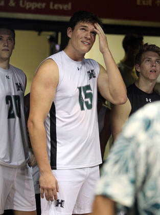 Hawaii Rainbow Warriors middle blocker Patrick Gasman watches as his ...