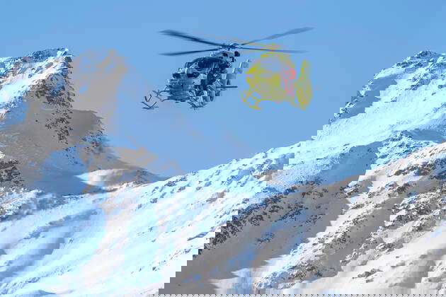 TOPIC PICTURE Mountain rescuers and air rescuers during the rescue of ...