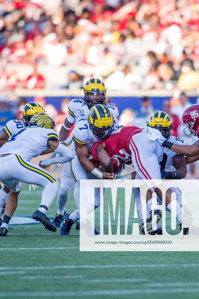 January 1, 2020: Alabama running back Najee Harris (22) being tackled ...