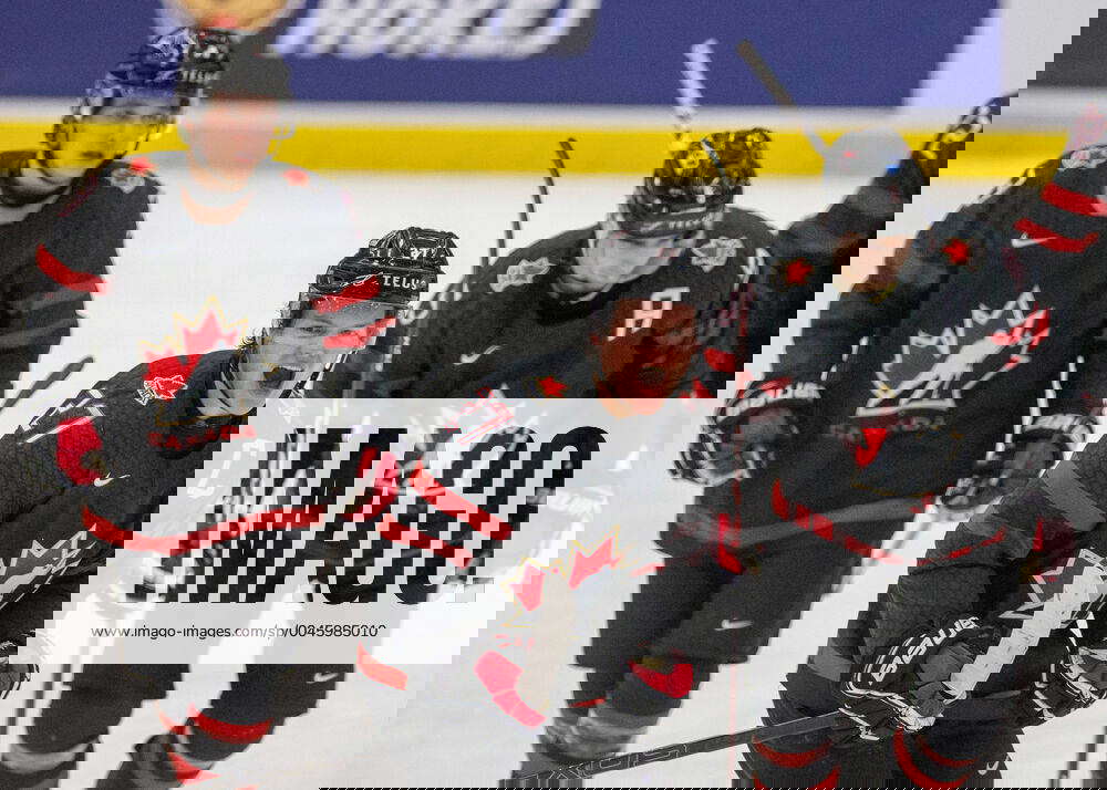 Calen Addison, Barrett Hayton and Joe Veleno of Canada celebrate after ...