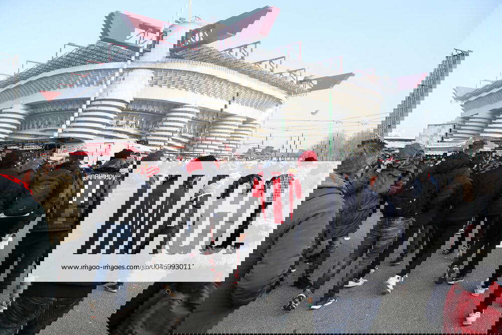 A fan arrives at the stadium wearing a shirt bearing the name of Zlatan ...