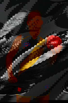 AFLW RICHMOND TIGERS TEAM PHOTO, Kodi Jacques of the Tigers poses for a ...