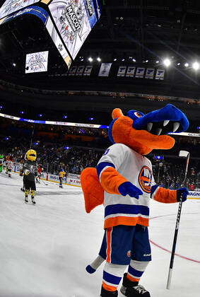 ST. LOUIS, MO. - JANUARY 25: New York Islanders mascot Sparky plays in ...
