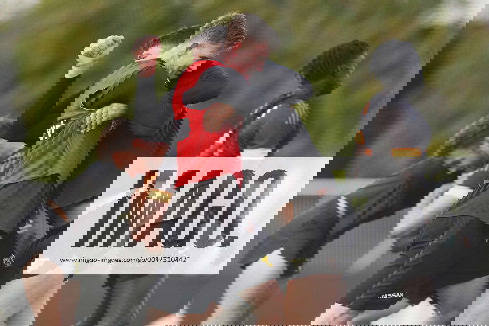 AFL HAWKS TRAINING, Sam Frost wrestles with Jonathon Patton of the ...