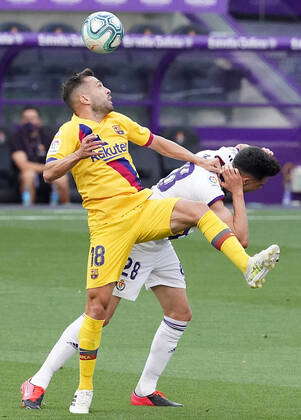 Real Valladolid s Kike Perez and FC Barcelona, Barca s Jordi Alba ...