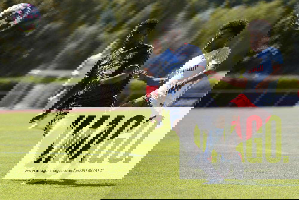 Karim Adeyemi of Salzburg fires a shot on goal as Marley Felix of Lyon ...