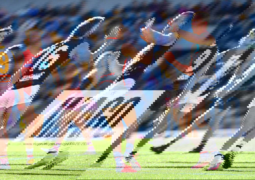 AFL LIONS SAINTS, Dan Butler (centre) of the Saints celebrates kicking ...