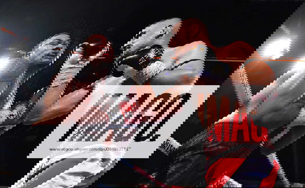 BOXING HUNI OPELU, Justis Huni lands a punch on Faiga Django Opelu ...