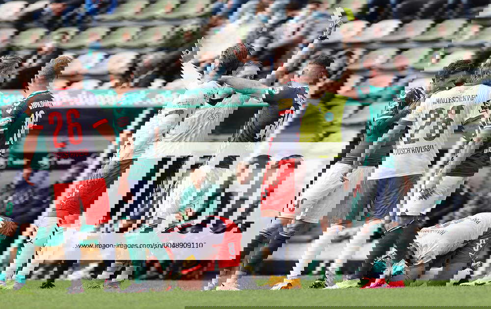 Referee Patrick Glaser shows Patrick Hobsch VfB Luebeck the yellow card ...