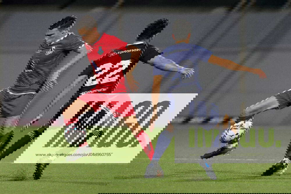 Myles Beerman of Sliema Wanderers goes past Cain Attard of Birkirkara ...