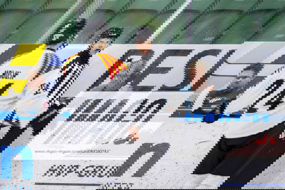 201112 Referee Mikael Andersson in conversation with Brynäs Emil Molin ...