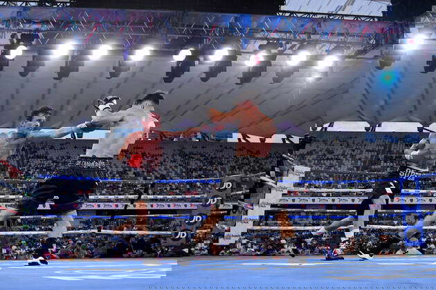 BOXING TSZYU MORGAN, Darragh Foley (left) strikes Ty Telford in their ...