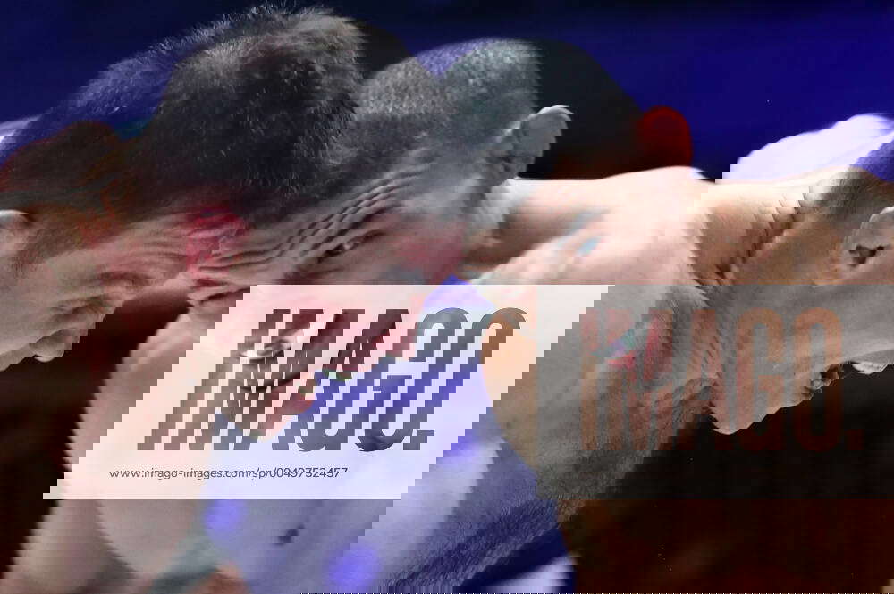 MOSCOW, RUSSIA - DECEMBER 18, 2020: Russian featherweight fighter Marat Balaev (L) and his