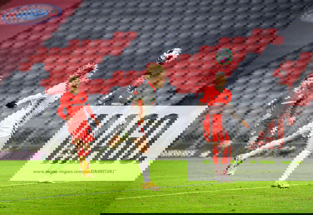 Leipzigs Emil Forsberg scores against Munichs Jerome Boateng and Leon ...