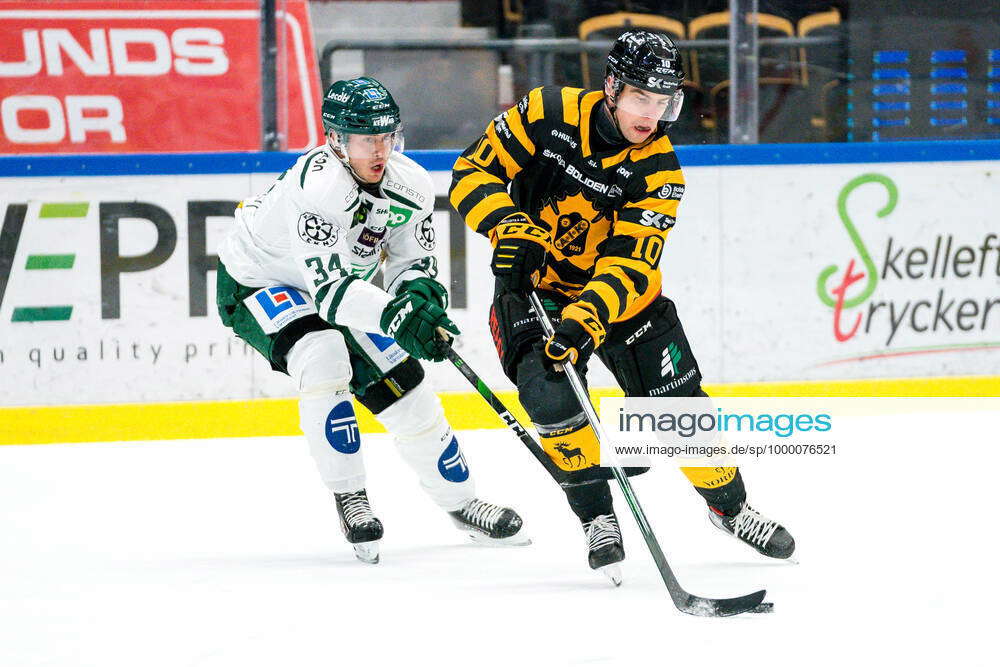 Skellefteas Joakim Lindström and Färjestads Michael Lindqvist during the ice hockey match in the