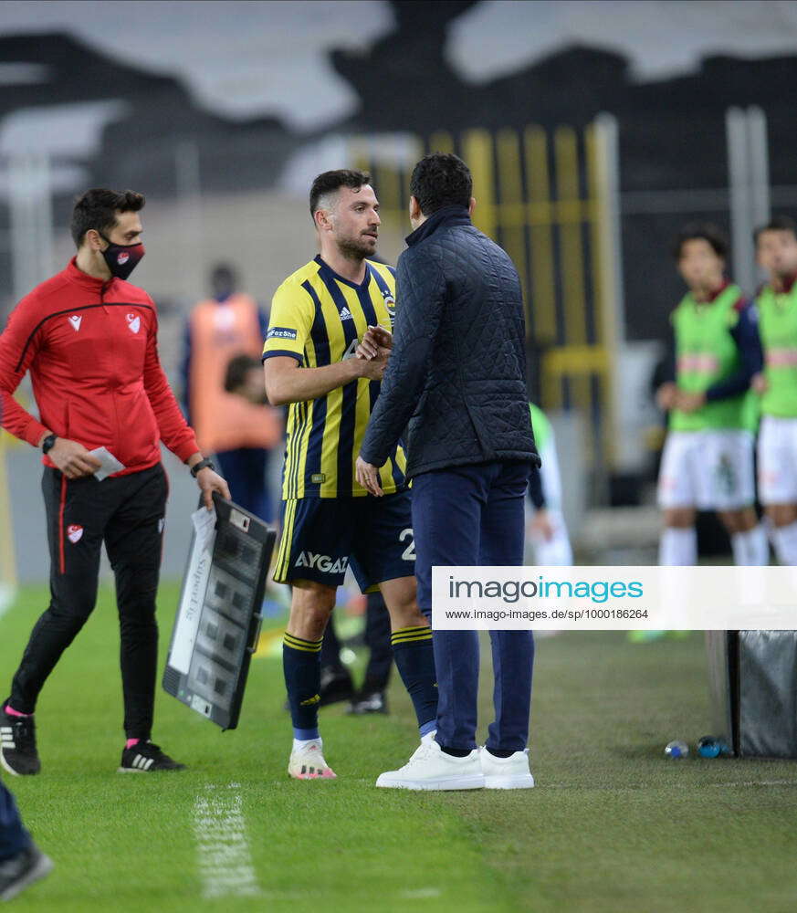 Sinan Gumus and Coach Erol Bulut of Fenerbahce during the Turkish Super ...
