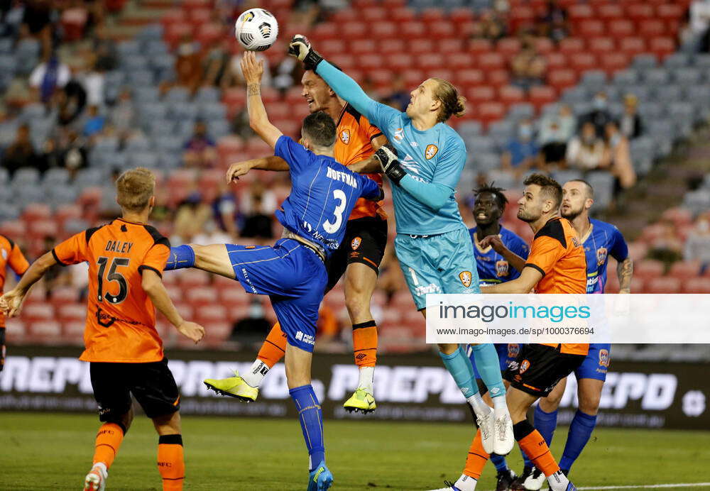 ALEAGUE JETS ROAR, Macklin Freke of the Roar punches the ball away from ...