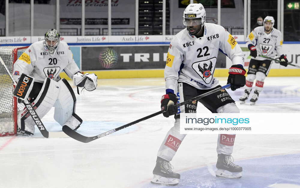 Dave Sutter, HCFG, left goalkeeper Reto Berra, HCFG, ZSC Lions HC ...