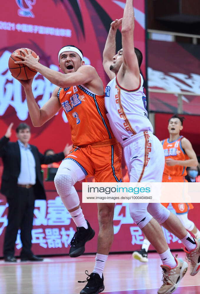 ZHUJI, Jan. 22, 2021 -- Kamiran Sdkjan of Fujian Sturgeons goes up for ...