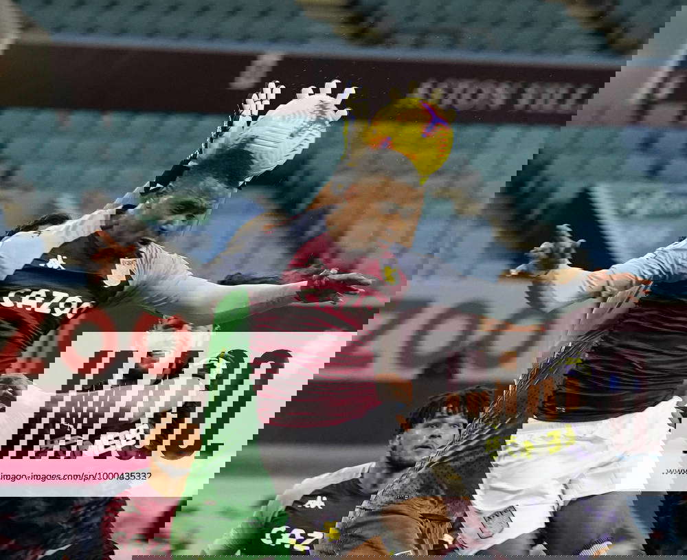 Eric Konsa of Aston Villa tussles with Andy Carroll of Newcastle United ...