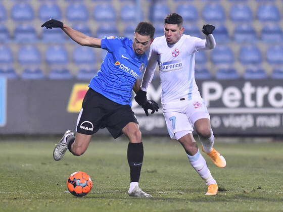Damien Dylan Dussaut and Florinel Teodor Coman in the football match ...