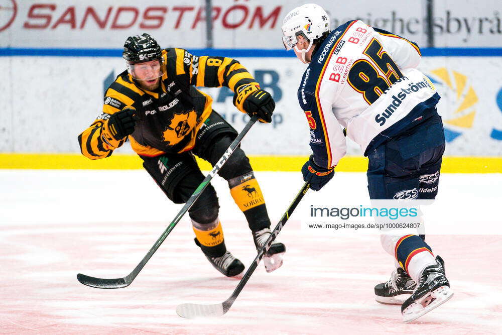210204 Djurgardens Michael Haga and Skellefteas Petter Granberg during the ice hockey match in the