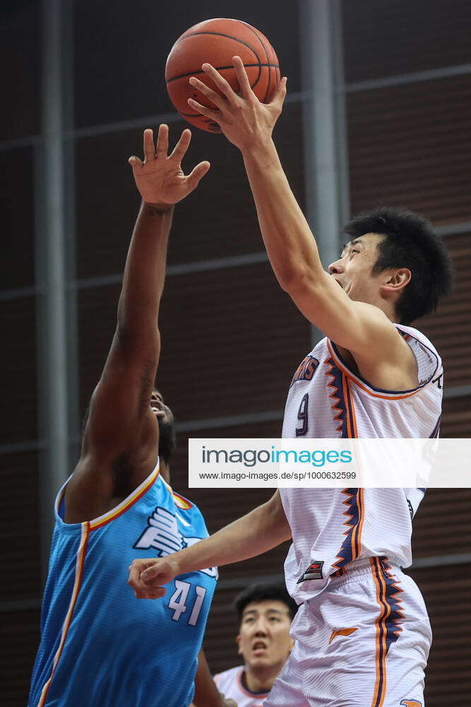 ZHUJI, Feb. 5, 2021 -- Ju Mingxin of Shanghai Sharks goes for a lay-up ...