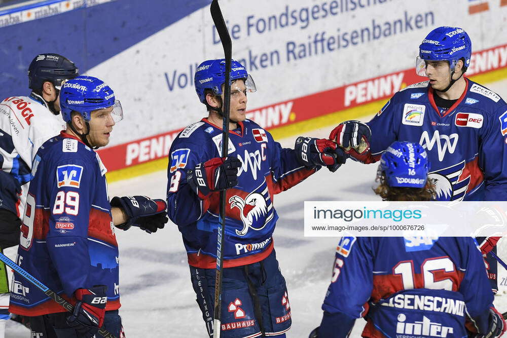 Cheering for the 2 0 in the middle of the picture the goal scorer ...